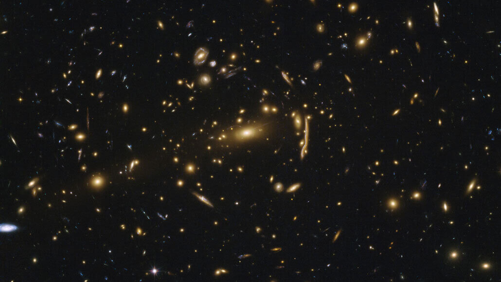 Dark matter clumps in galaxy clusters bend light surprisingly well - Ideas and Discoveries
